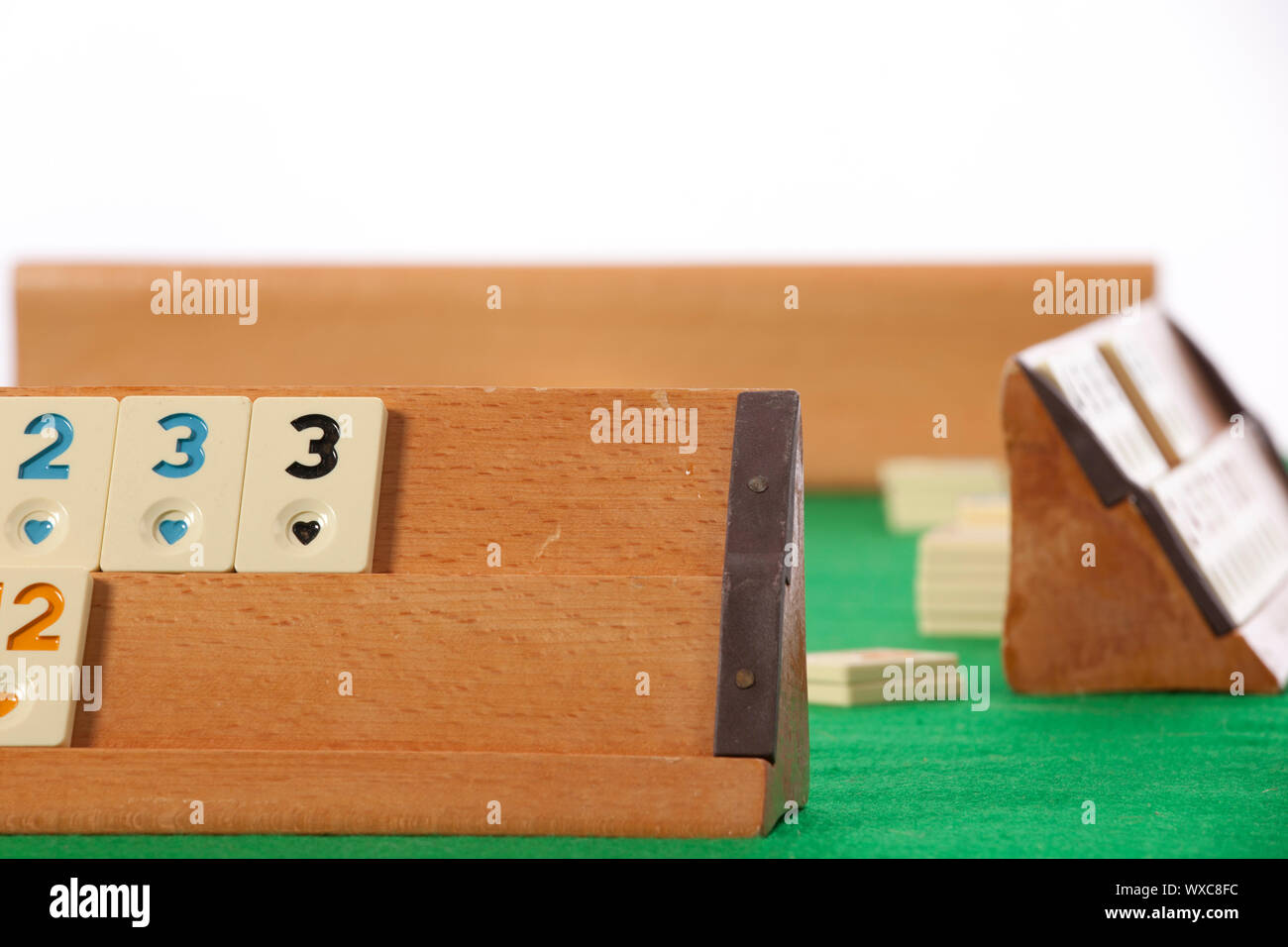 empty rummy table over green background Stock Photo - Alamy