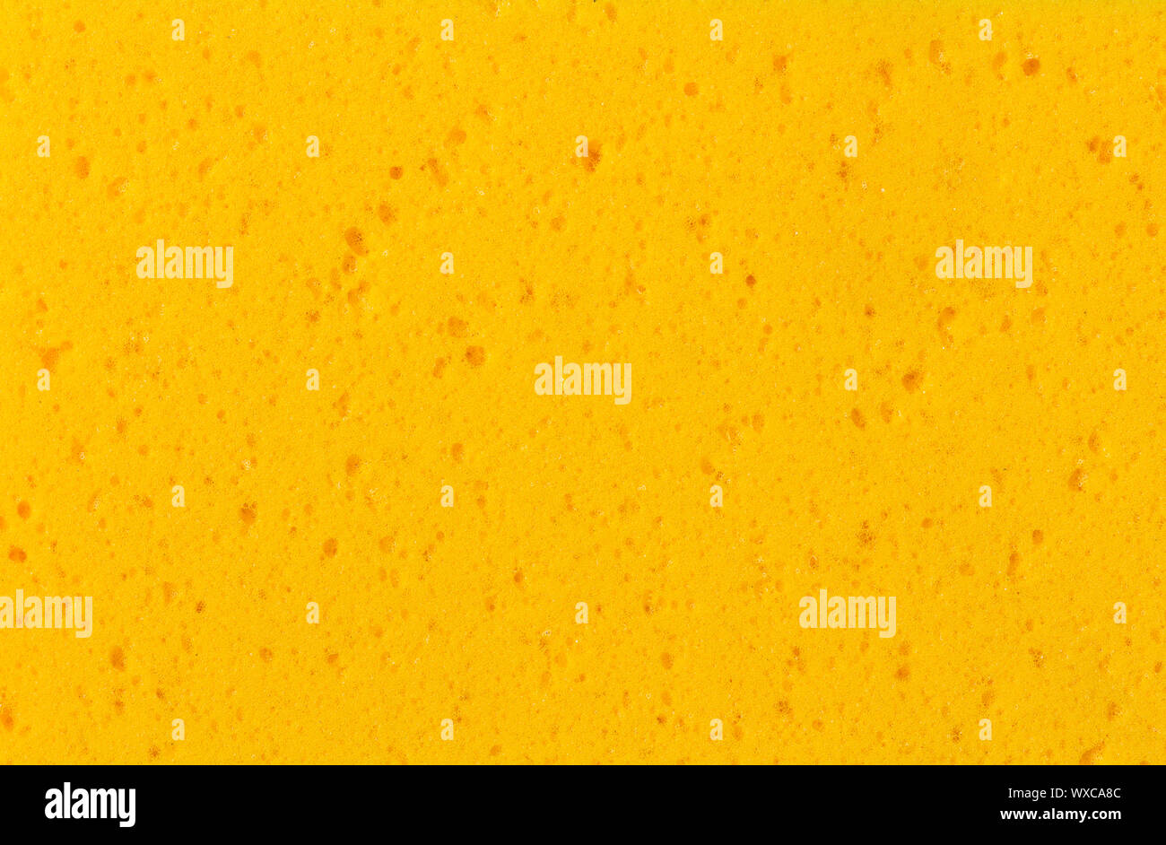 Sponge texture background, yellow sponge for background Stock Photo - Alamy