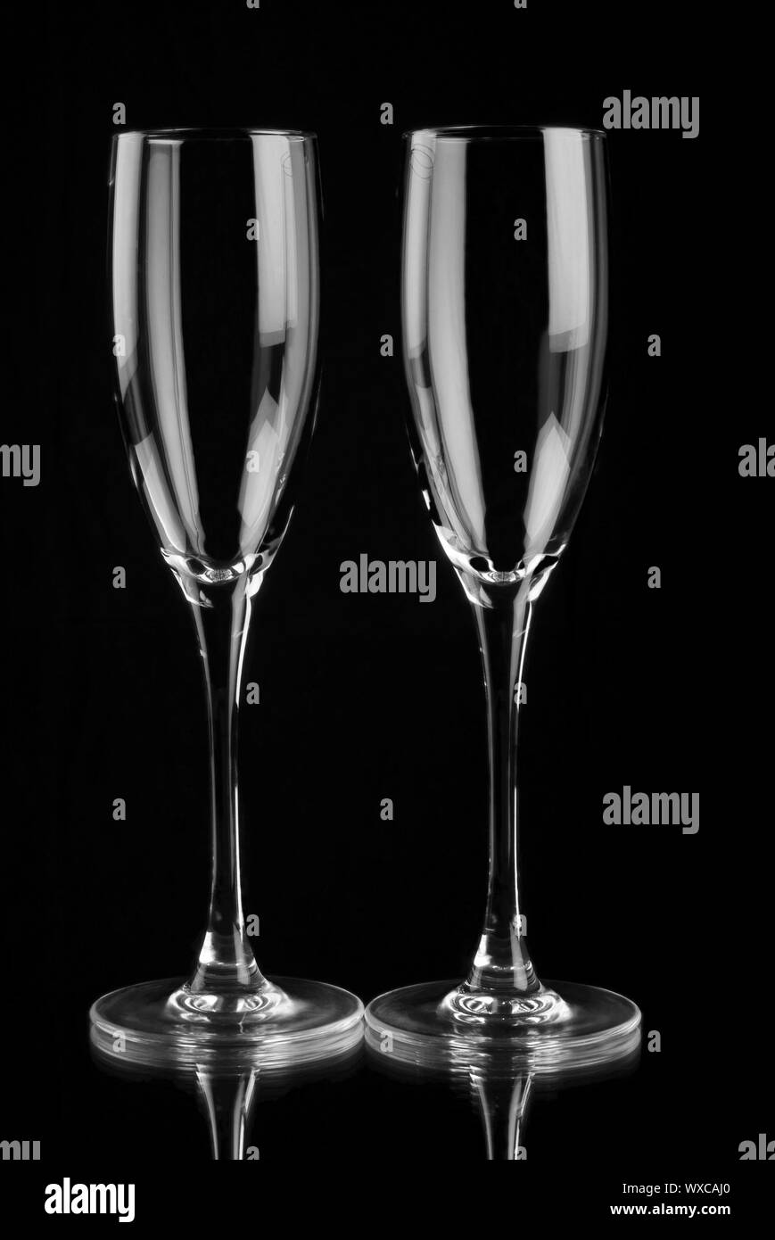 Empty champagne flutes Black and White Stock Photos & Images - Alamy