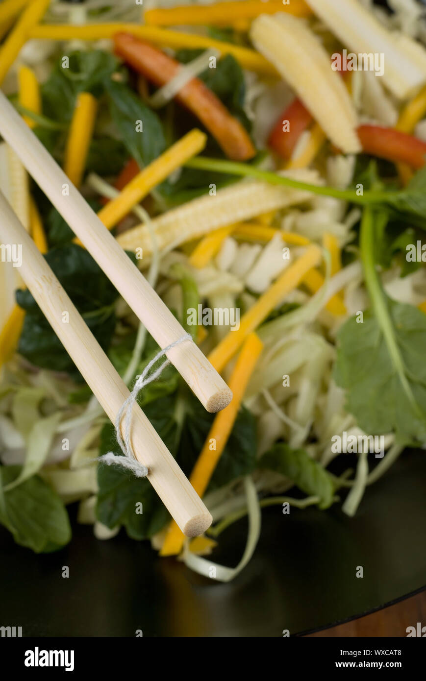 Raw stir fry food in wok ready for cooking Stock Photo - Alamy
