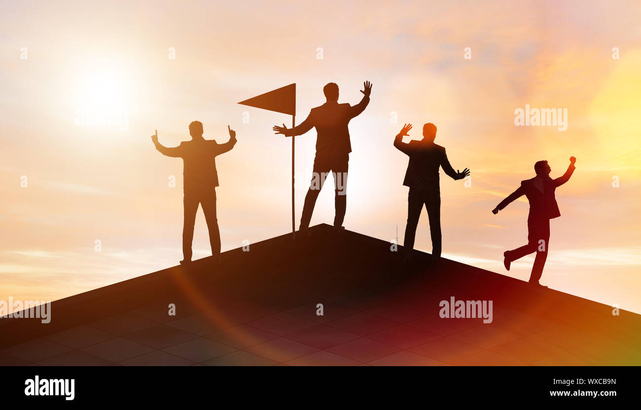 Businessmen in achievement and teamwork concept Stock Photo - Alamy
