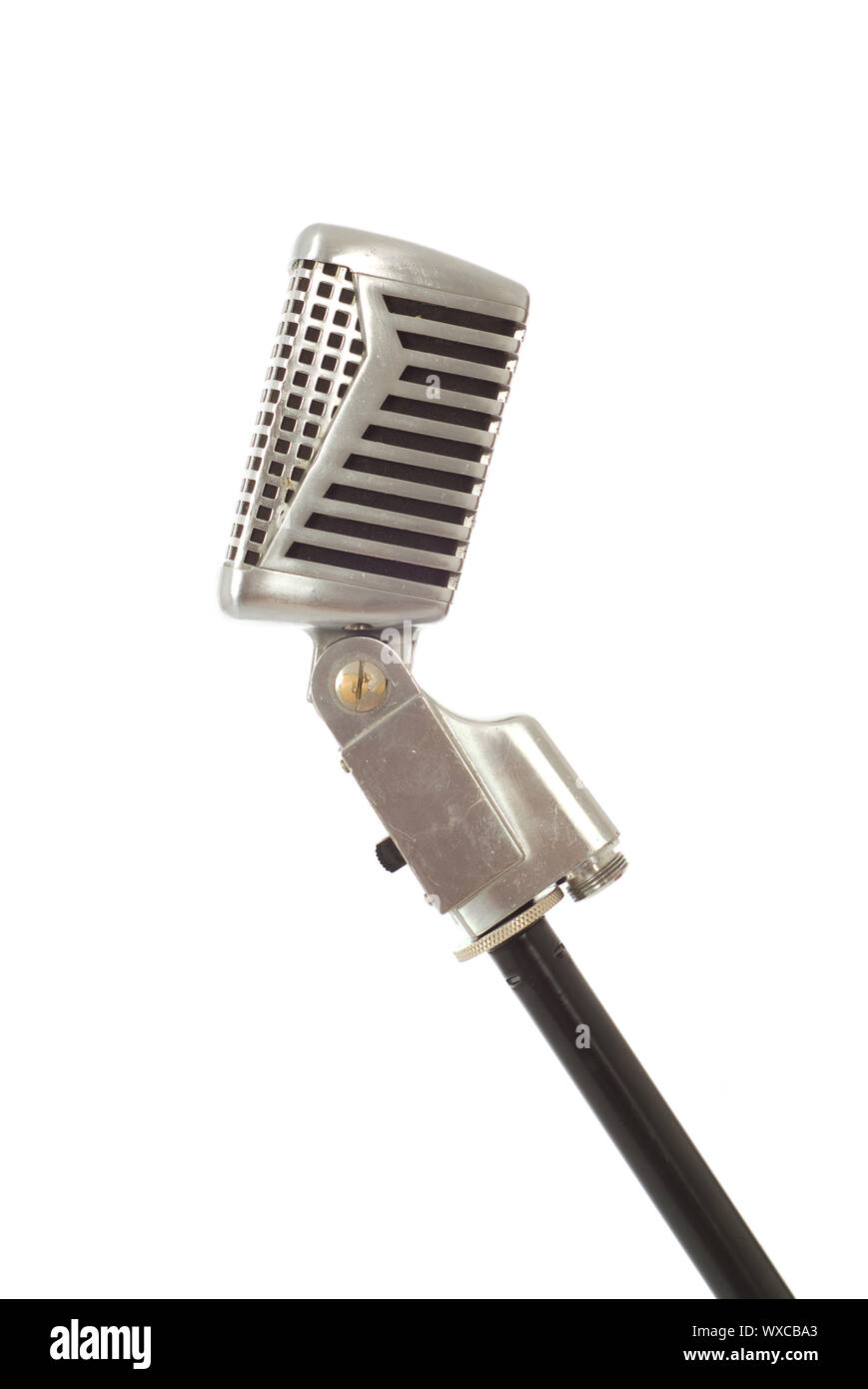 Vintage recording, announcing or singing microphone isolated on white ...
