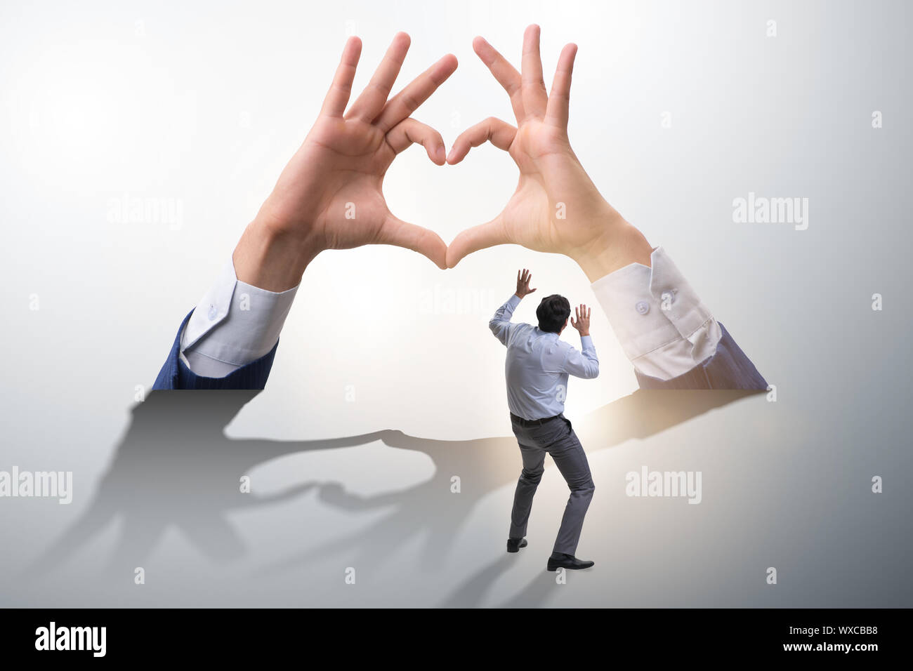 Excited person with hands making heart hi-res stock photography and ...
