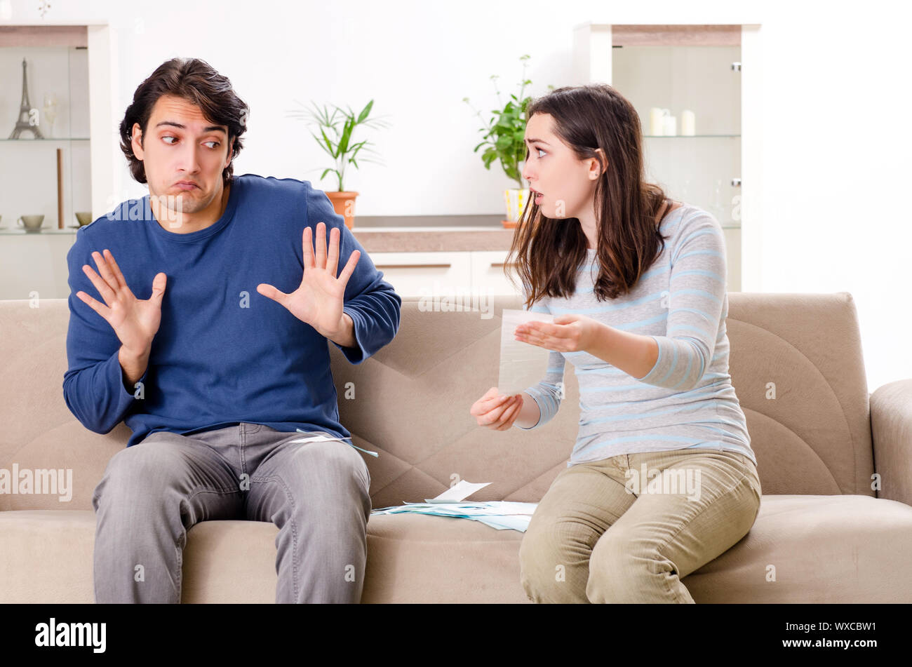 Couple arguing budget expenses hi-res stock photography and images - Alamy