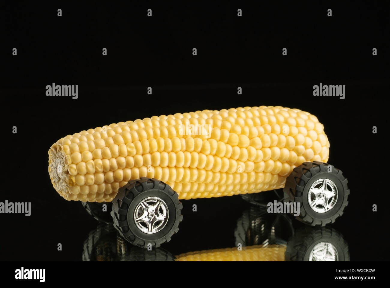 Sweet Corn Car with Reflection on Mirror, Bio Fuel Concept Stock Photo ...