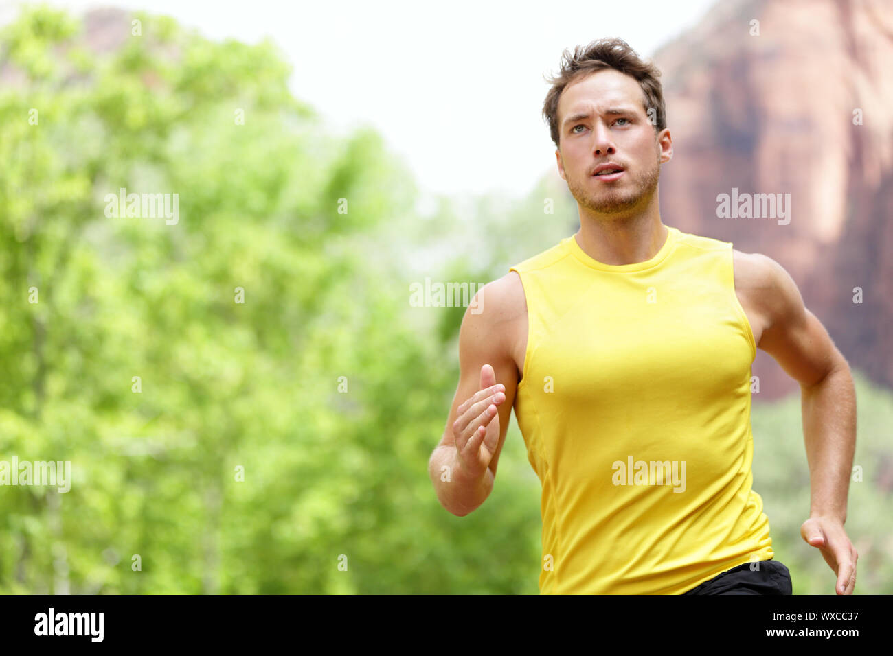 Sport - Runner. Man running with concentration, determination and ...