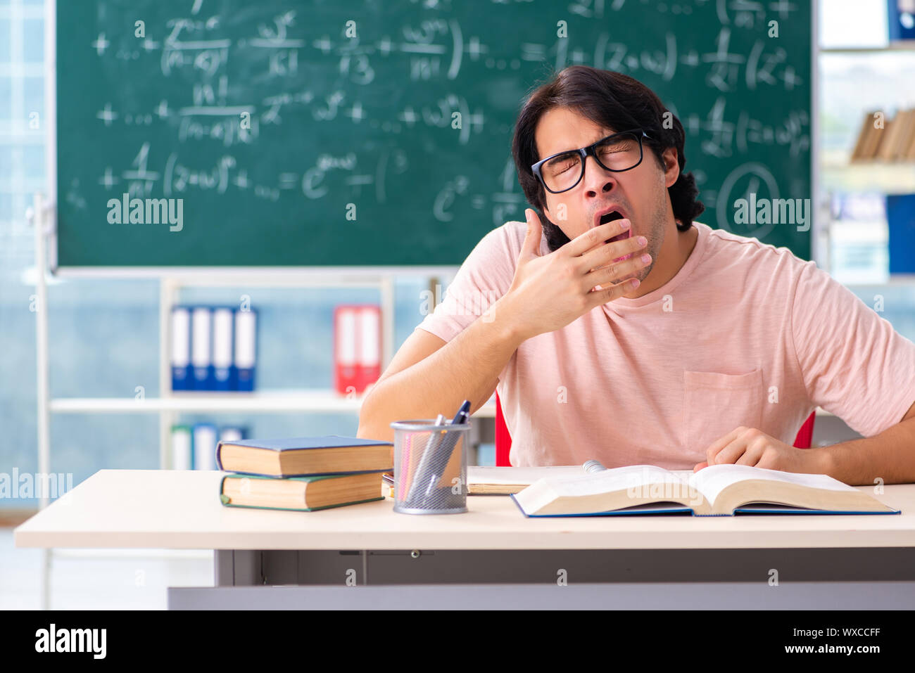 Student yawning classroom hi-res stock photography and images - Alamy