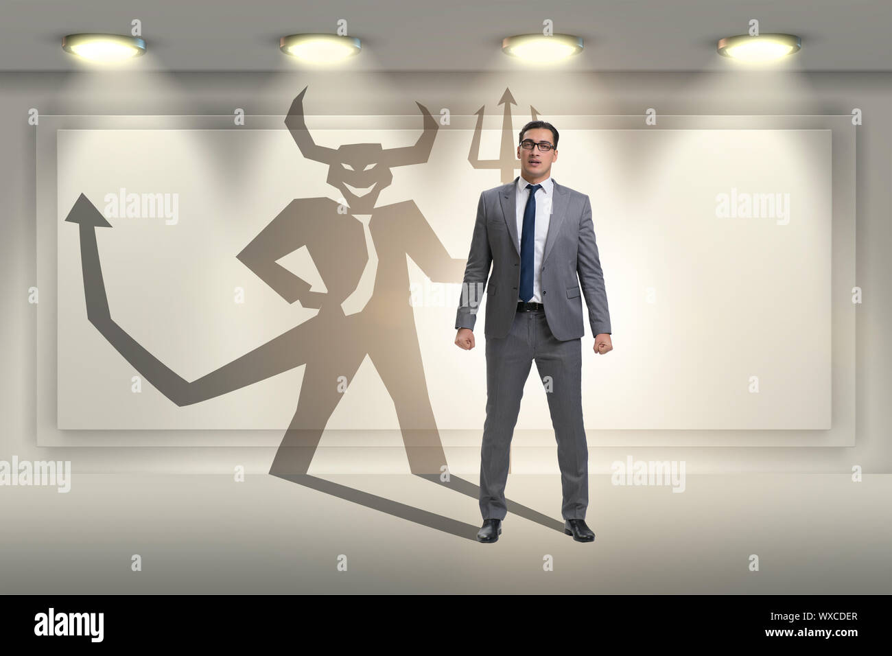 Business man angel shadow hi-res stock photography and images - Alamy