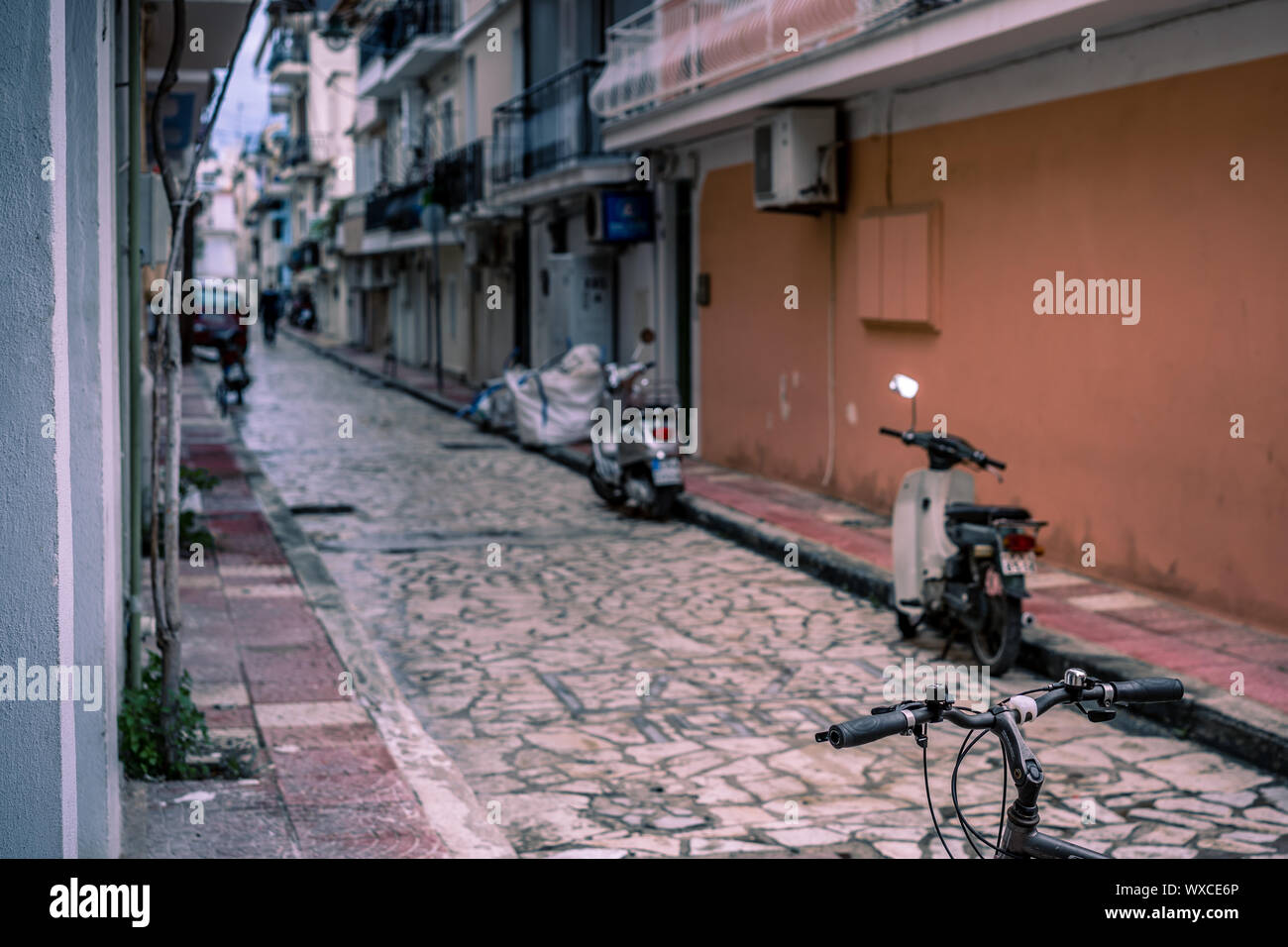Local people riding scooters hi-res stock photography and images - Alamy