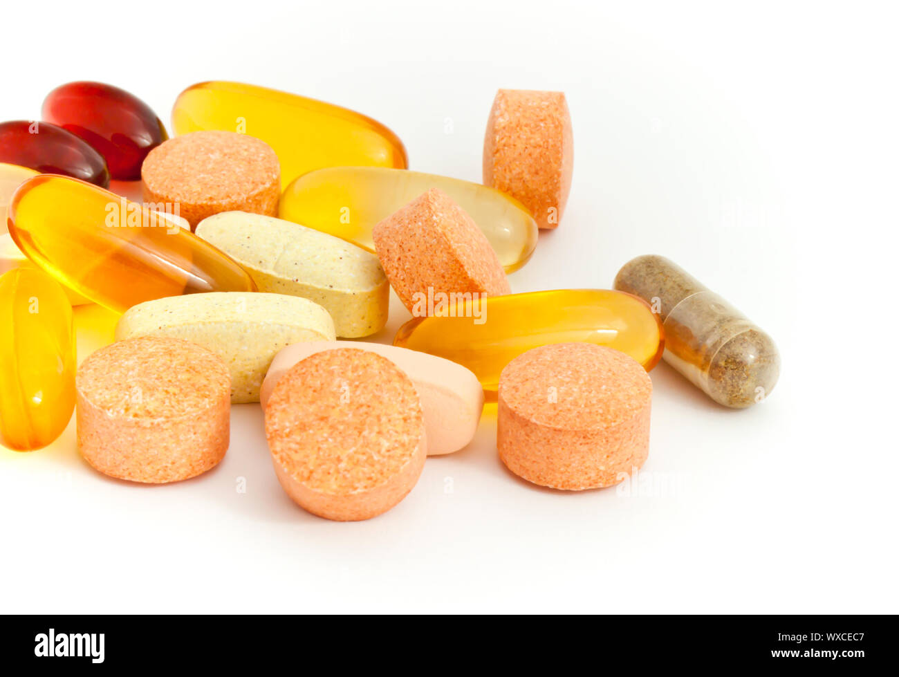 Supplements on white background Stock Photo - Alamy