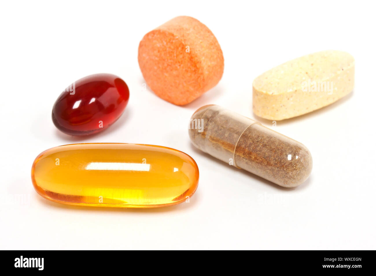 Five supplements isolated on white background Stock Photo - Alamy