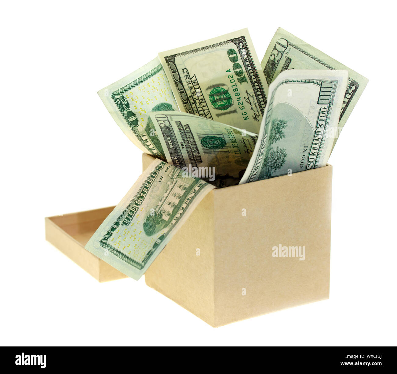 US dollar bills in the box on white background Stock Photo - Alamy