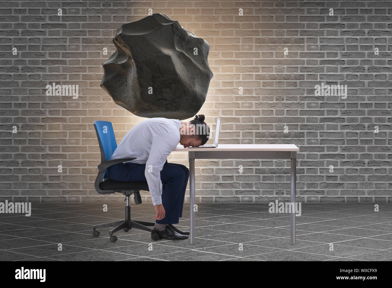 Employee under the burden of work Stock Photo - Alamy