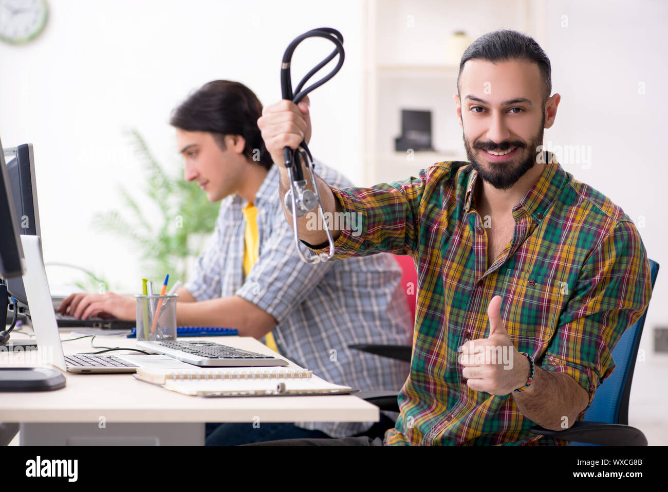 IT engineers working on hardware issue Stock Photo - Alamy