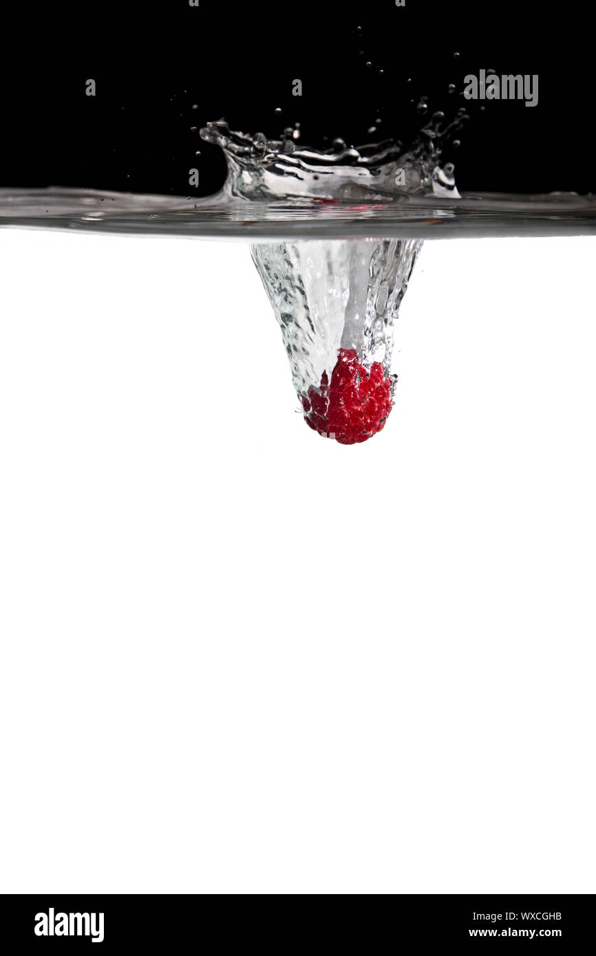 Raspberry in water Stock Photo - Alamy