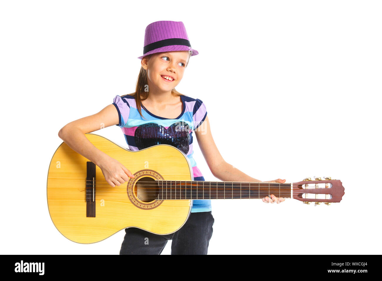 Portrait of a cute girl posing at studio. Isolated on white background ...