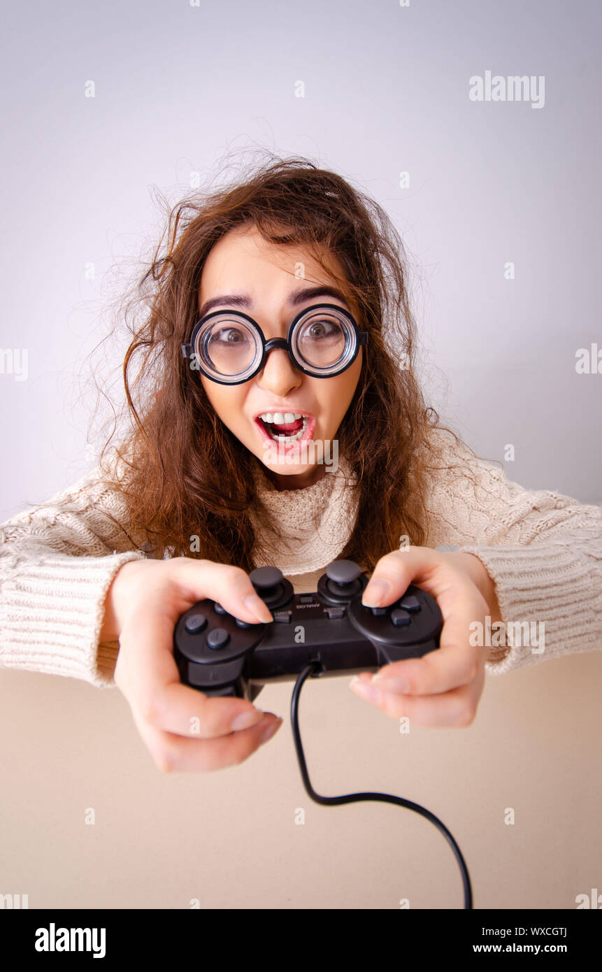 Funny nerd girl working on computer Stock Photo - Alamy