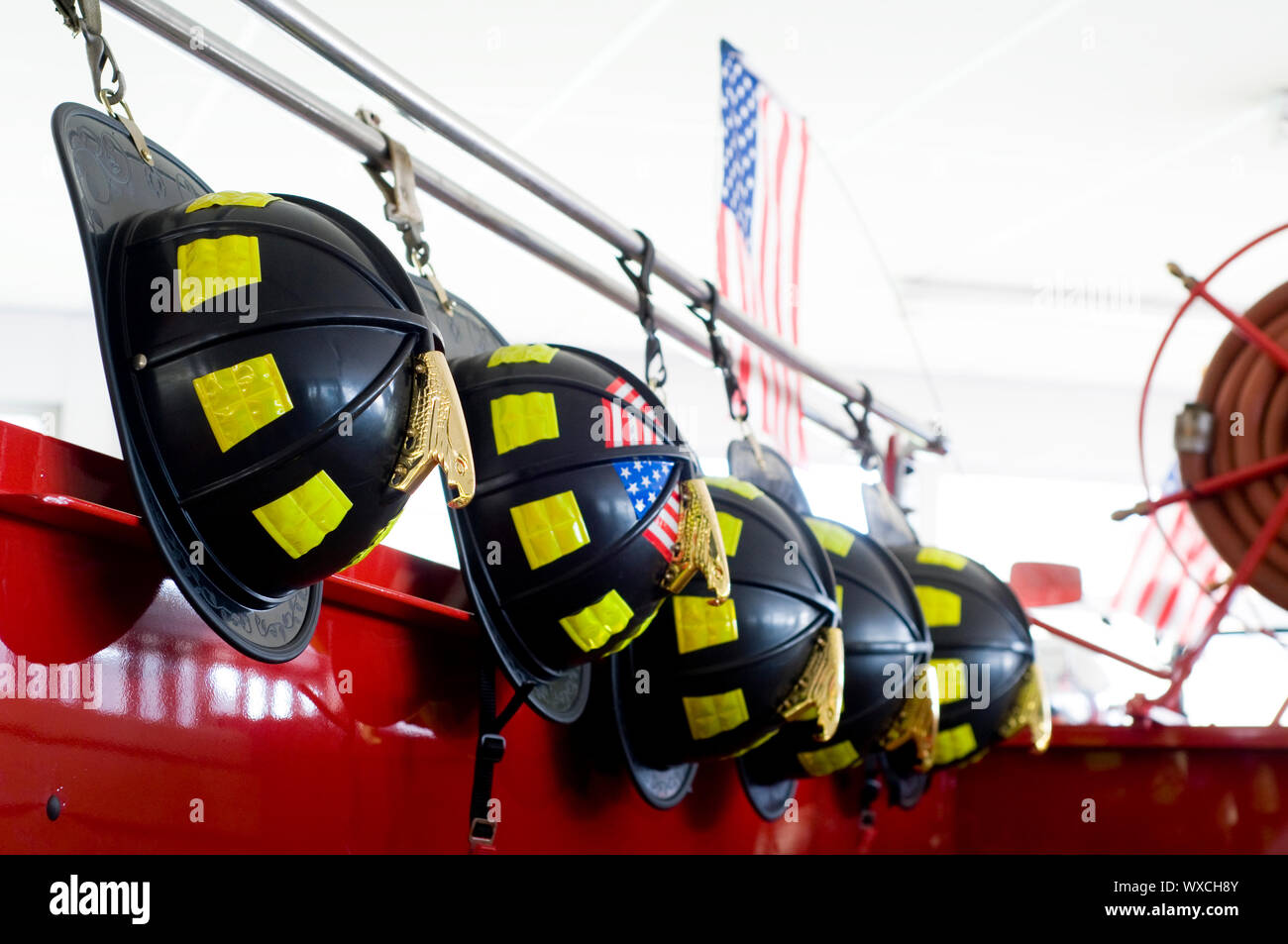 black fire brigade helmets Stock Photo - Alamy