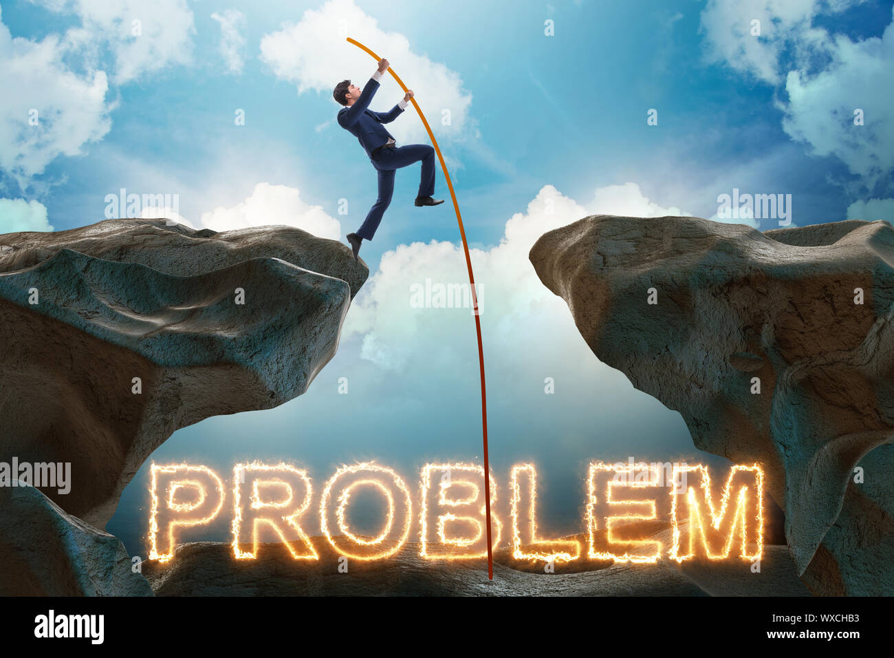 Man jumping chasm hi-res stock photography and images - Alamy