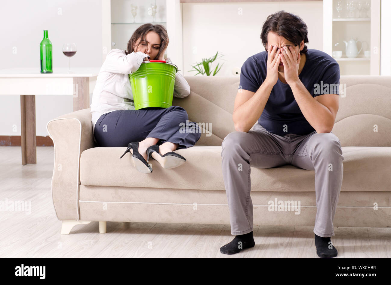 Young wife suffering from sick stomach and vomiting Stock Photo - Alamy
