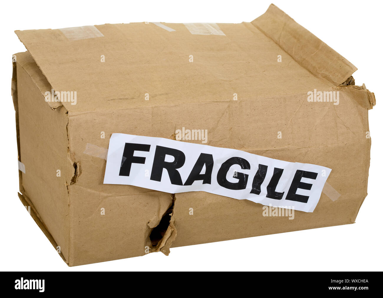 Crumpled cardboard box with inscription "fragile" on white Stock Photo ...