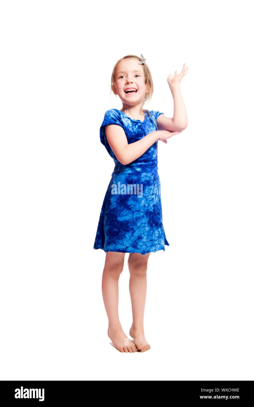 Exited little girl rising hand to pay attention Stock Photo - Alamy