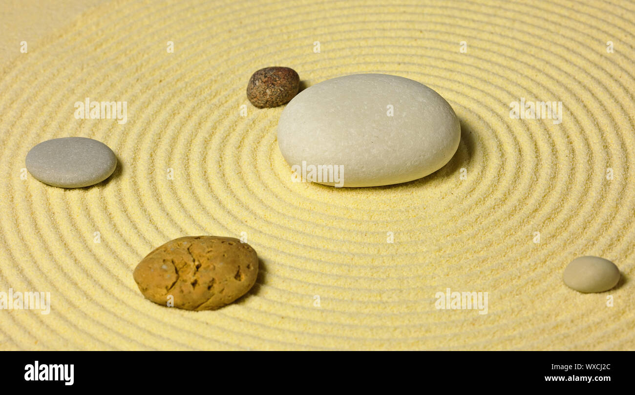 Scheme of the solar system from the stones on the sand Stock Photo - Alamy
