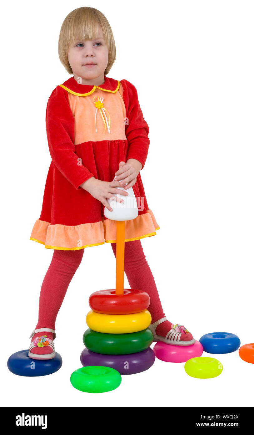 Little girl and toy plastic pyramid on white Stock Photo - Alamy
