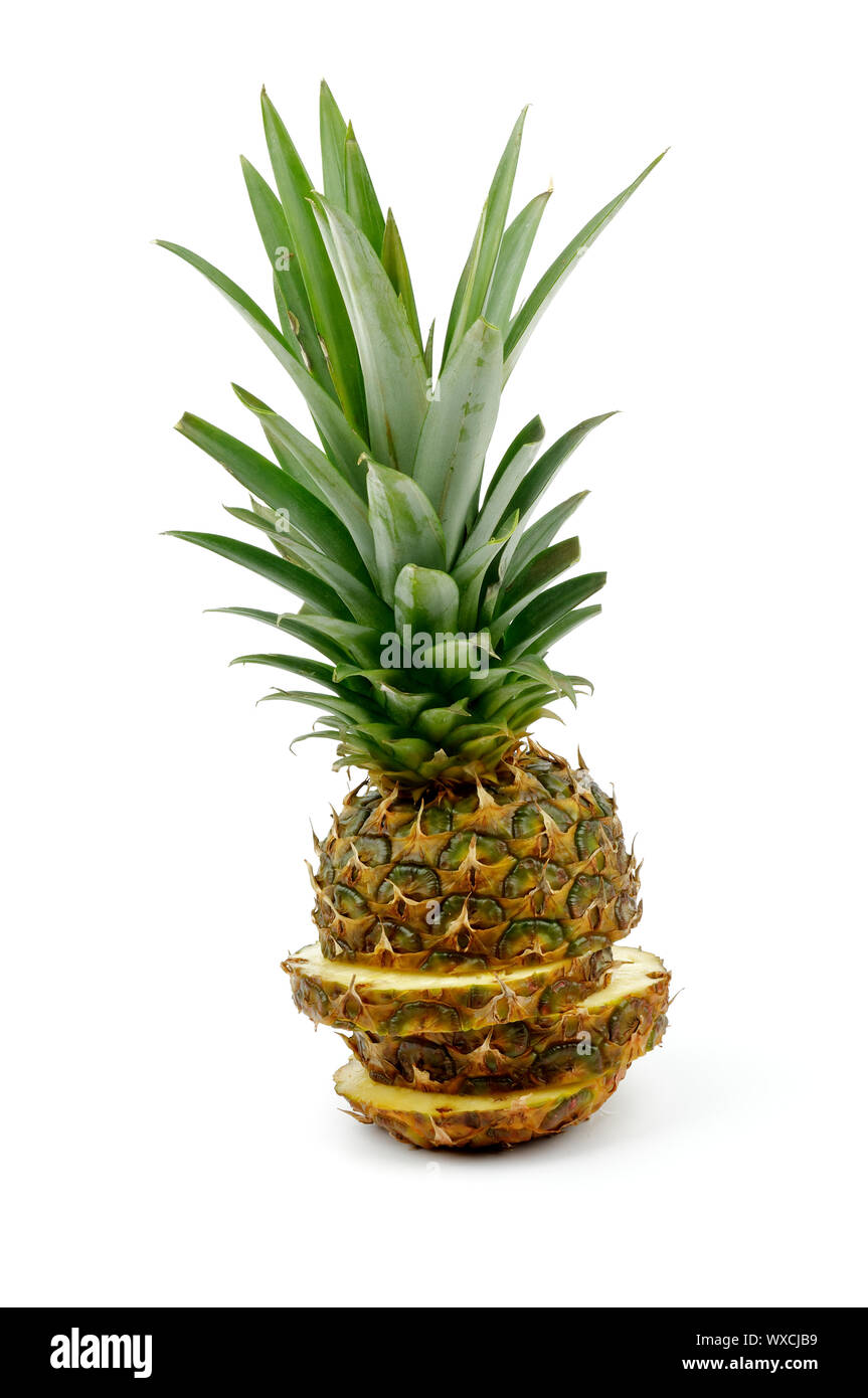 Stack of Perfect Ripe Sliced Pineapple isolated on white background ...