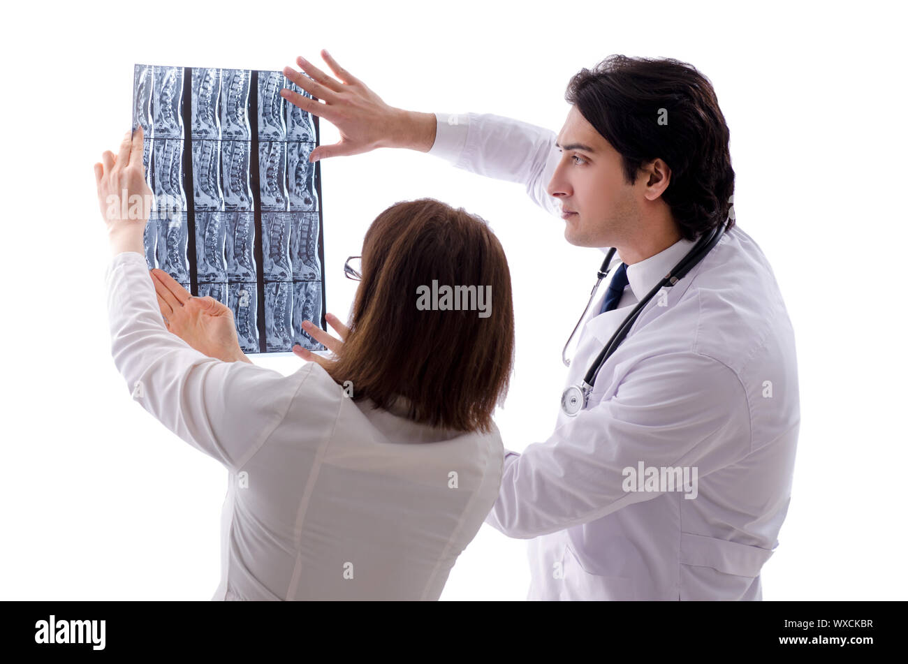 Doctor examining woman in hospital Cut Out Stock Images & Pictures - Alamy