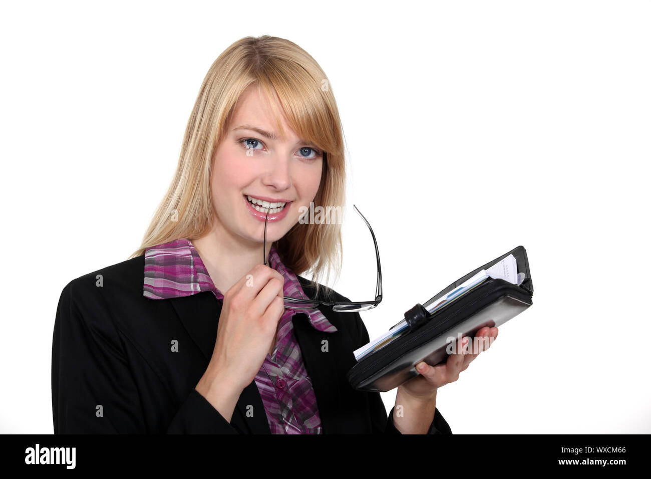 Female office worker with a diary Stock Photo - Alamy