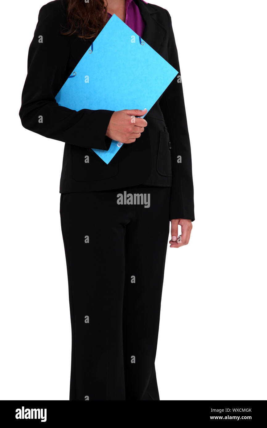 Woman holding folder Stock Photo - Alamy