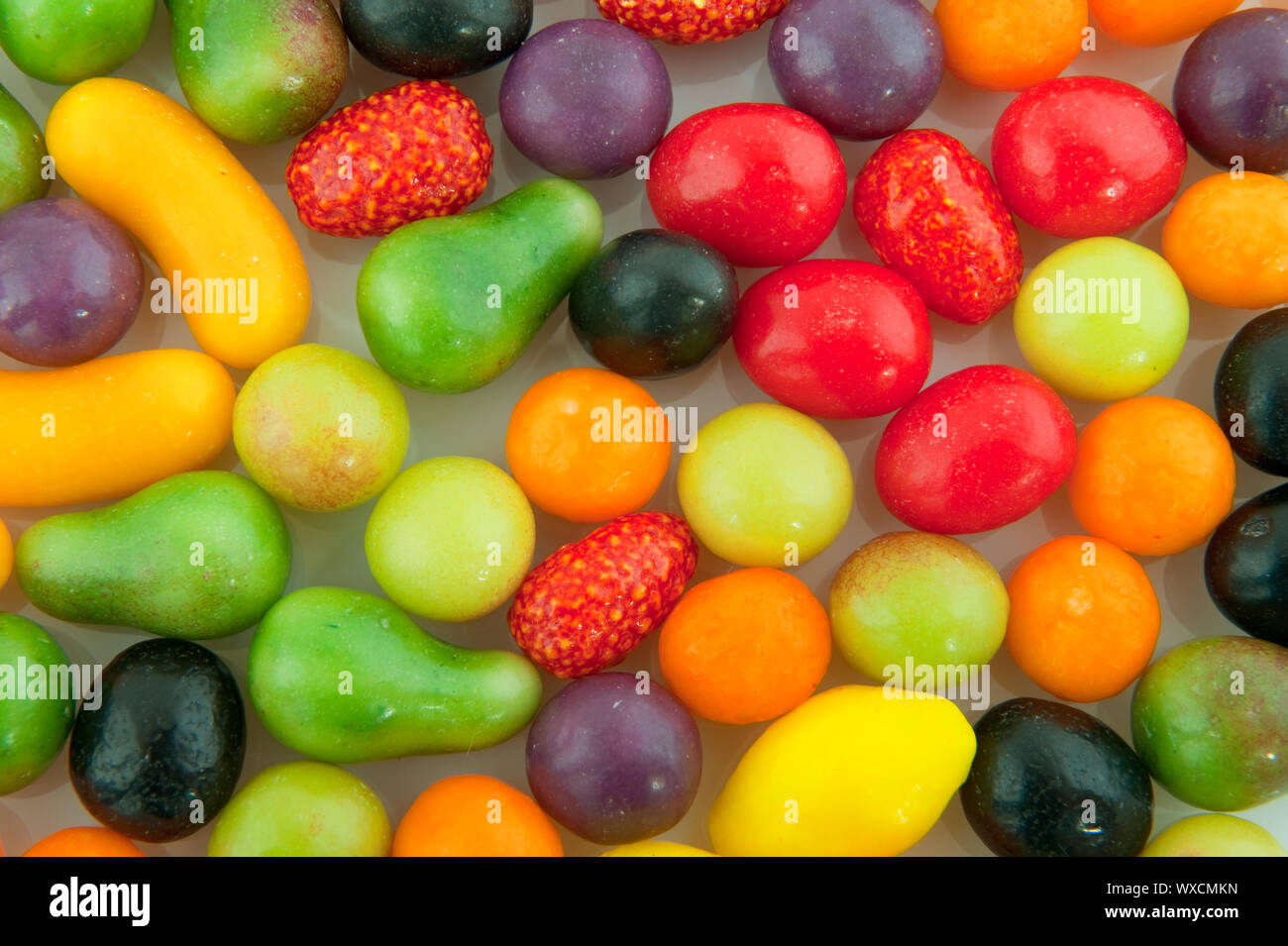 Many colorful candy sweets in fruit shape Stock Photo - Alamy