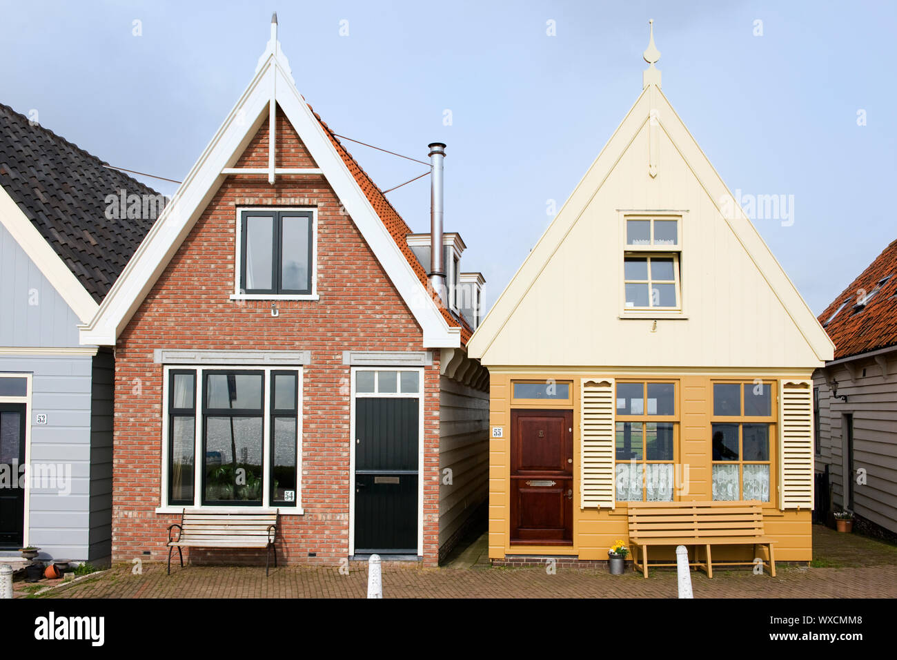 Typical Dutch houses with blinds and benches Stock Photo - Alamy