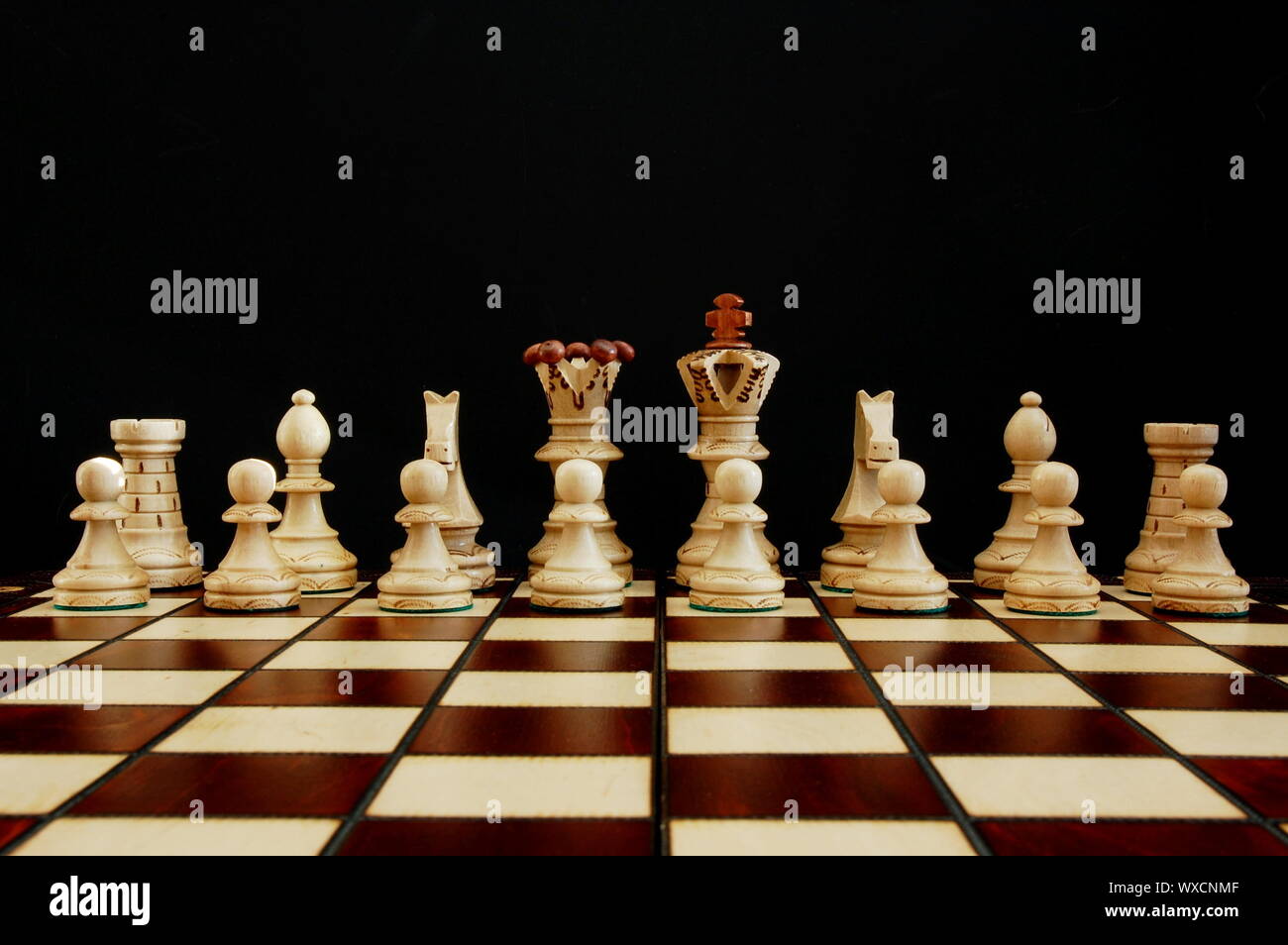 chess pieces showing concept of conflict power and success Stock Photo ...