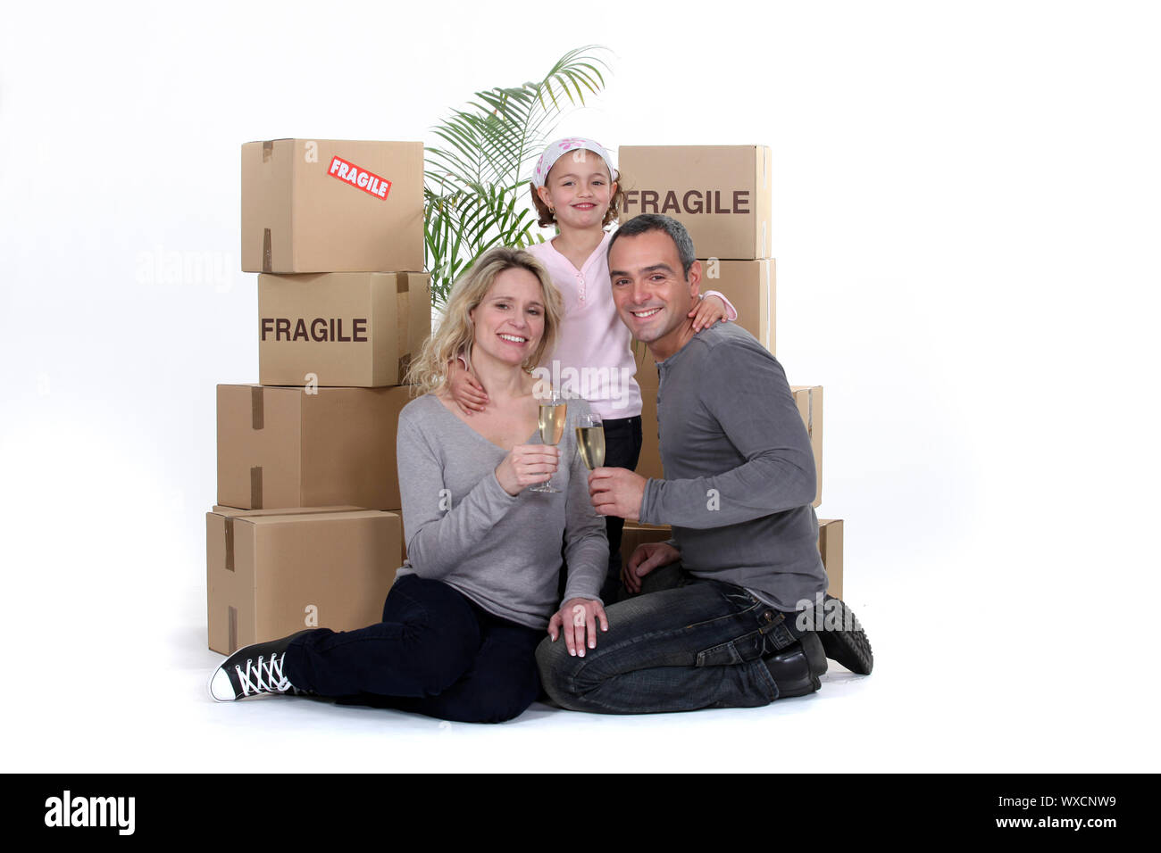 Family couple cardboard boxes Cut Out Stock Images & Pictures - Alamy