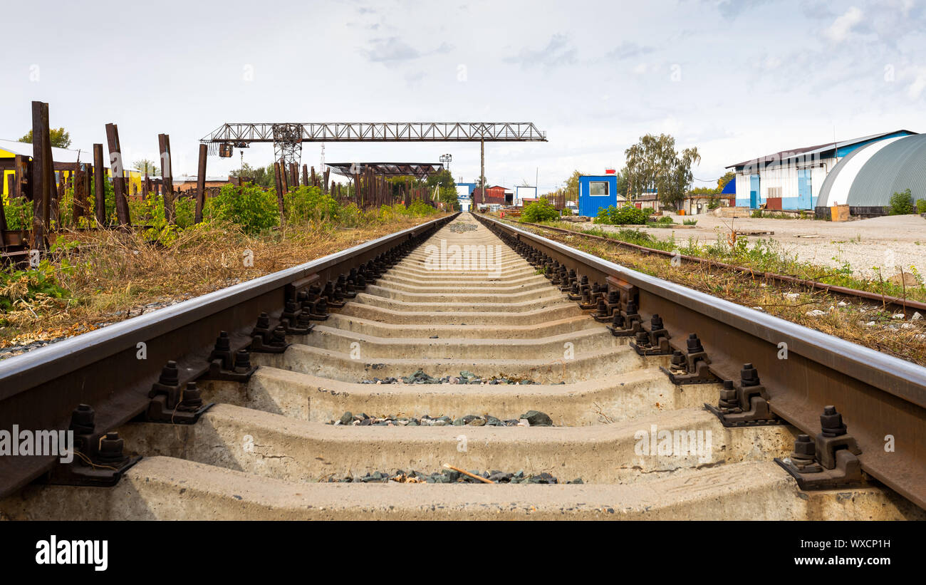 large plan railroad tracks against the background of a construction ...