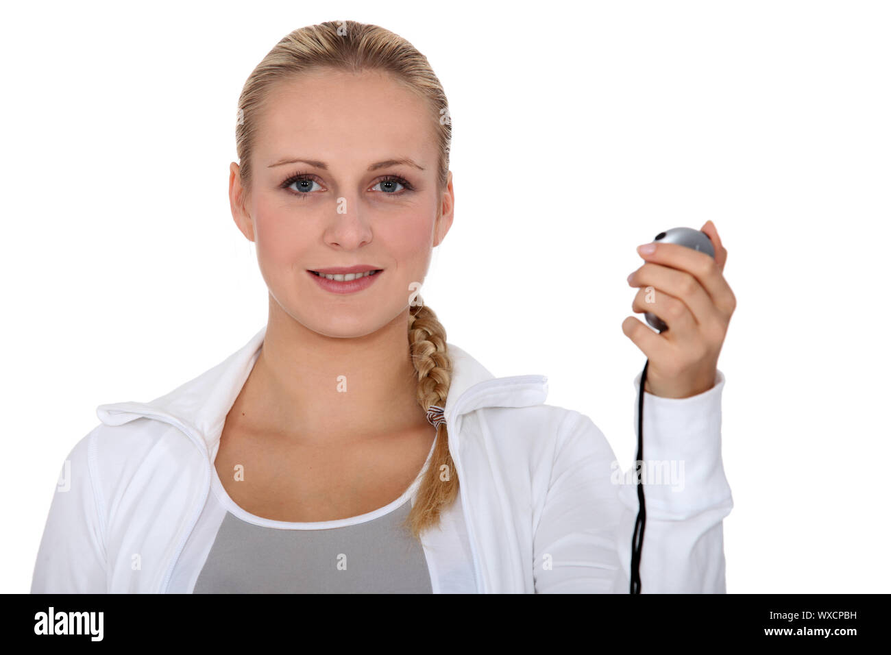 Woman with timer Stock Photo - Alamy