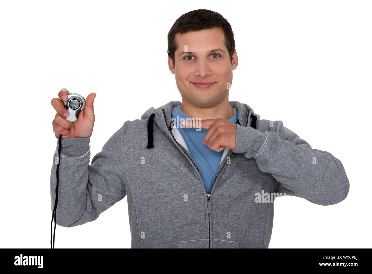 Man holding stopwatch Stock Photo - Alamy