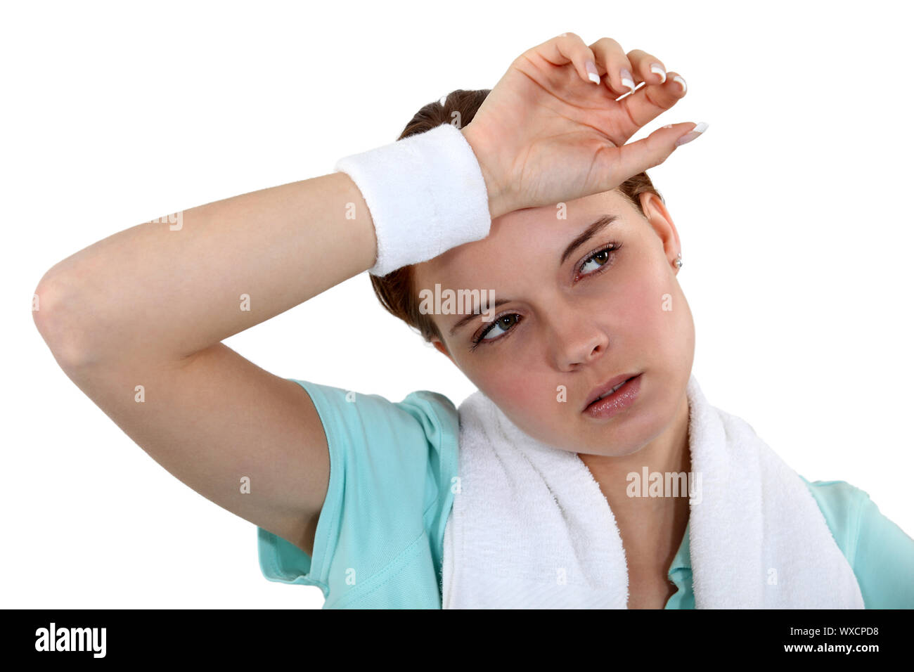 Woman exhausted after workout Stock Photo - Alamy