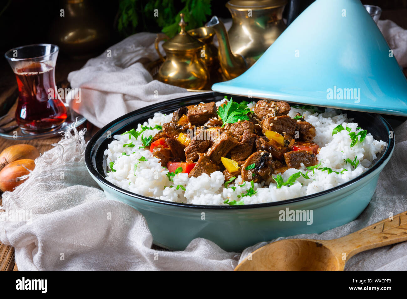 Tajin beef stew with rice paprika and sesame seeds Stock Photo - Alamy