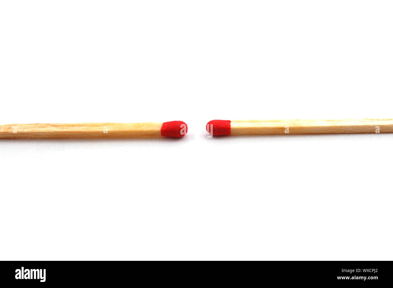 Some red matches isolated on a white background Stock Photo - Alamy