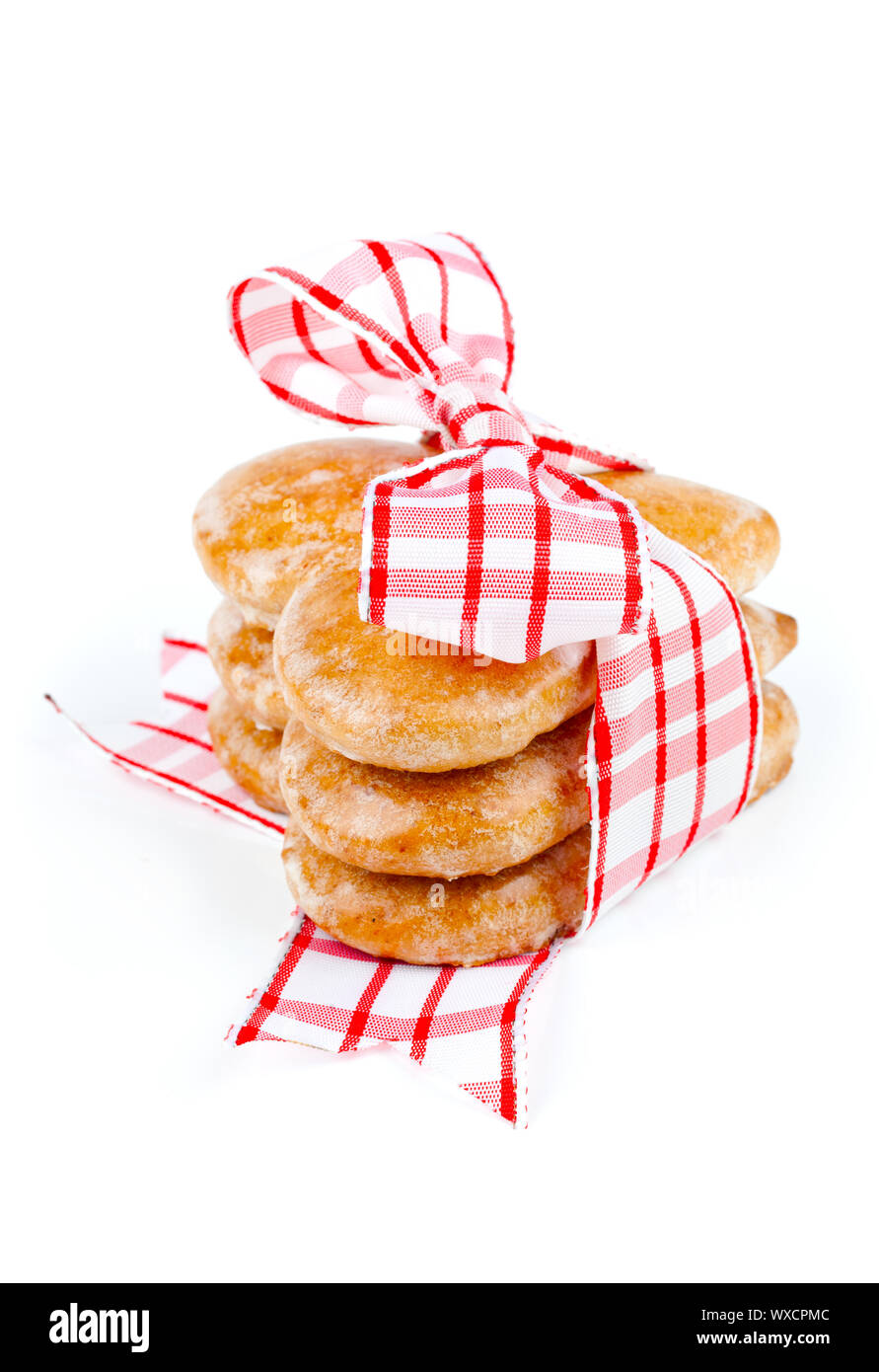 Cookies-hearts connected by a red tape on a white background Stock ...