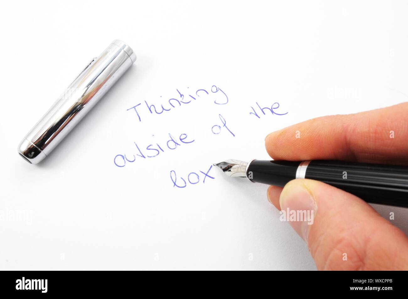 think outside of the box concept with pen and paper Stock Photo - Alamy