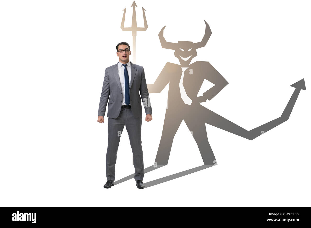 Devil hiding in the businessman - alter ego concept Stock Photo - Alamy