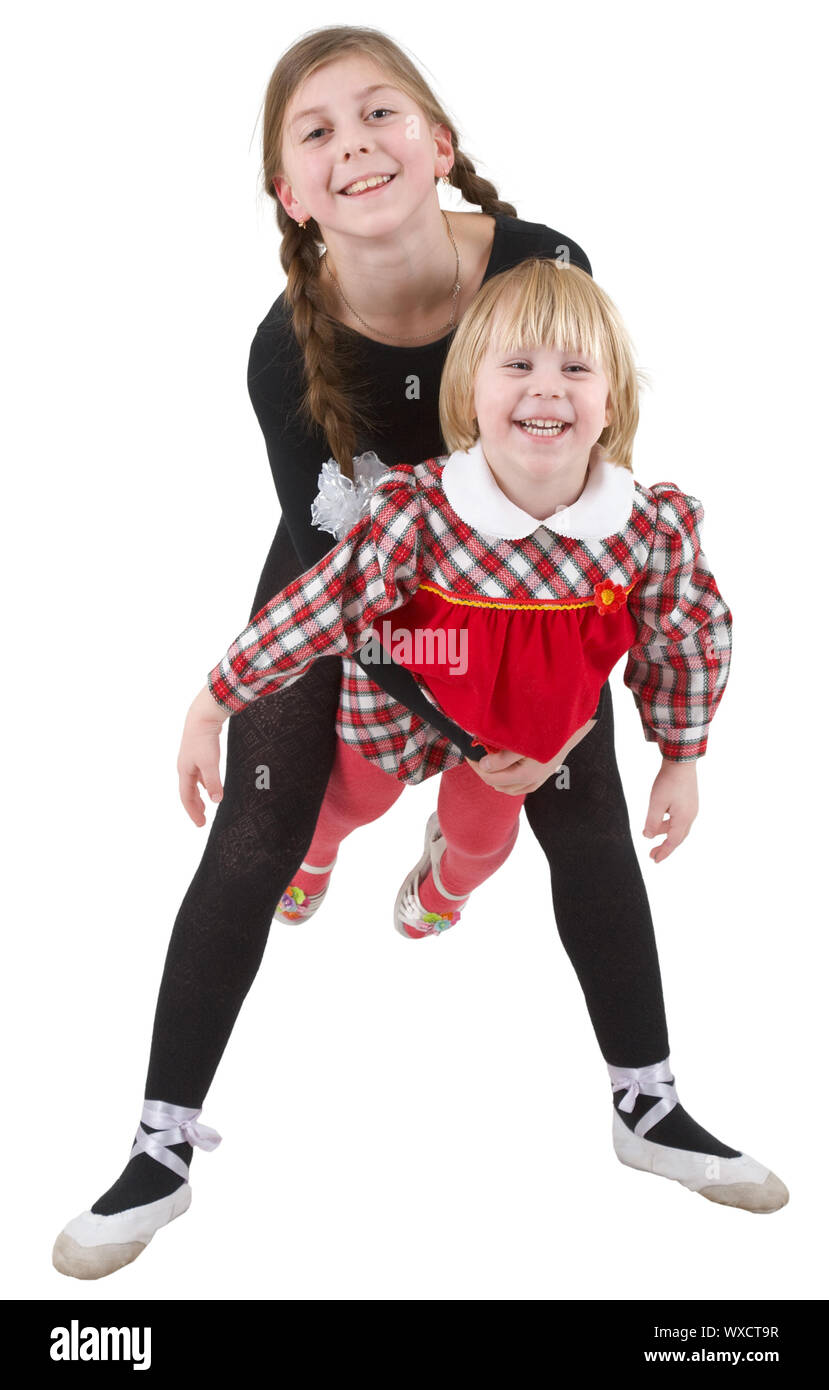Two little acrobat girls on the white background Stock Photo - Alamy