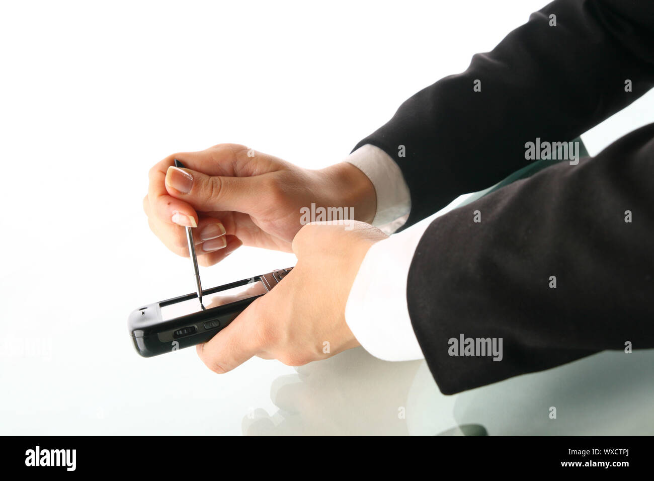 girl hand work on communicator Stock Photo - Alamy