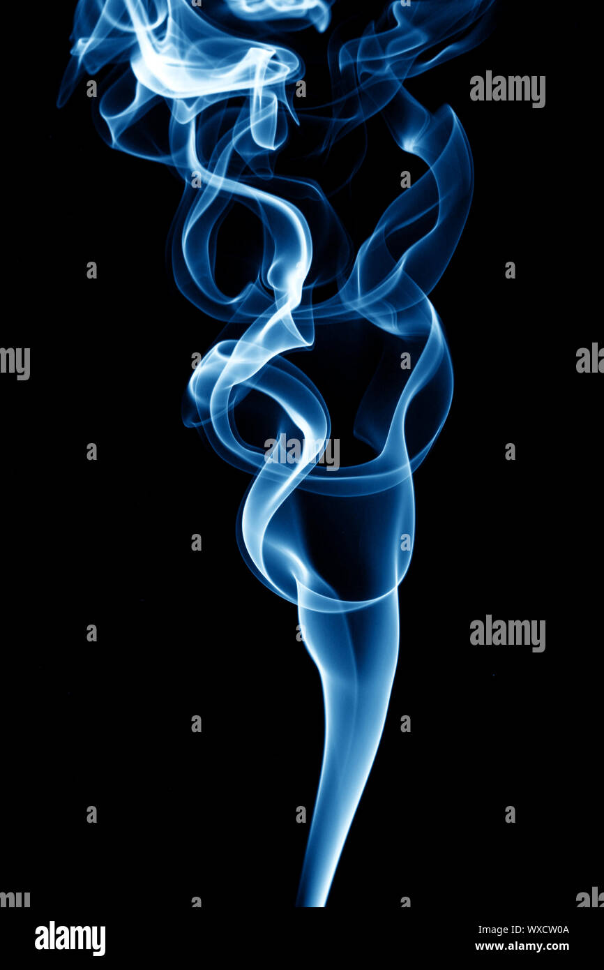 blue smoke on black background Stock Photo - Alamy
