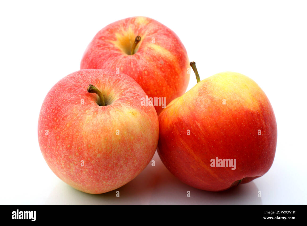 three apple isolated on white background Stock Photo - Alamy