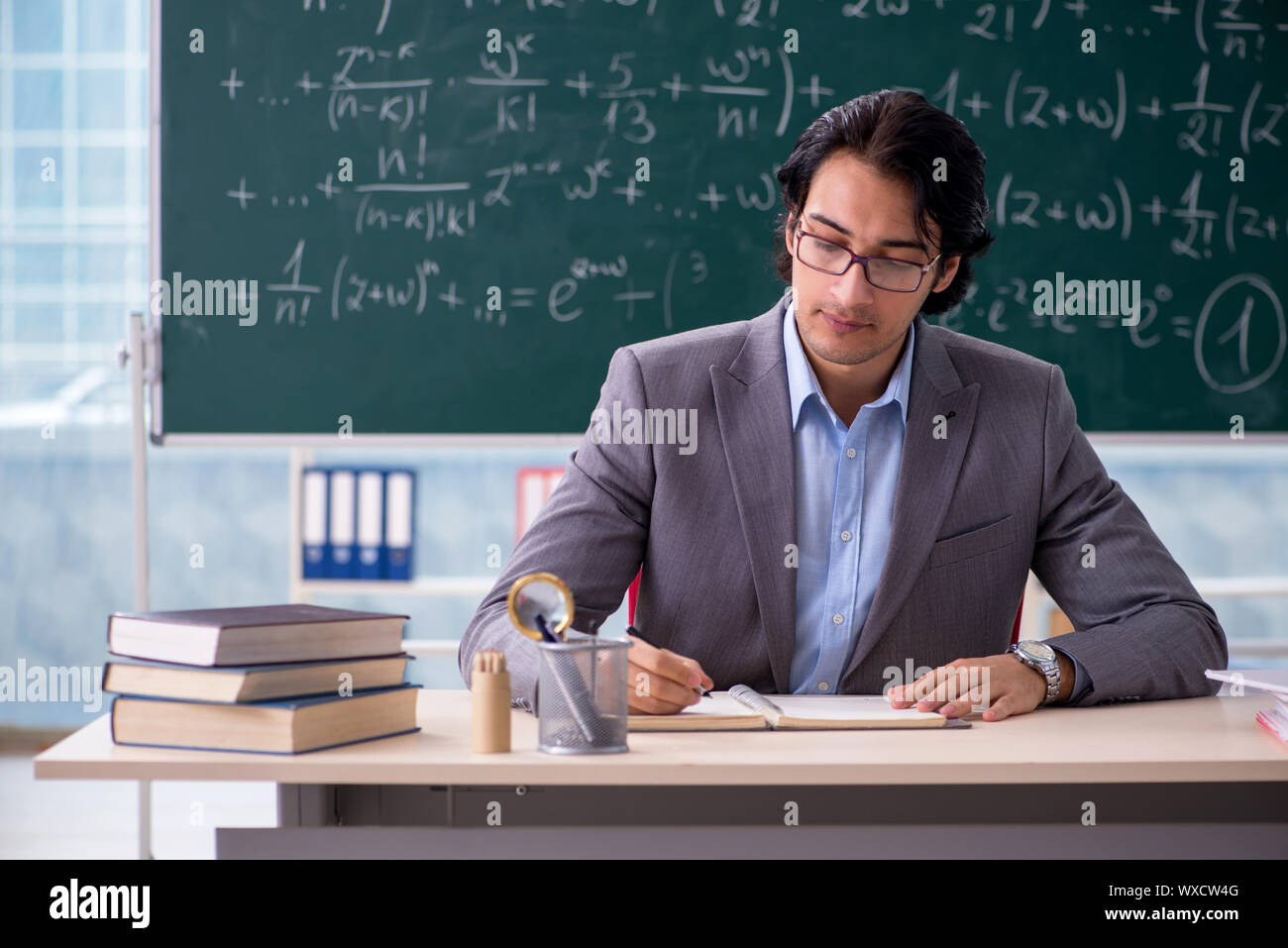 Professor teaching reading, writing hi-res stock photography and images ...